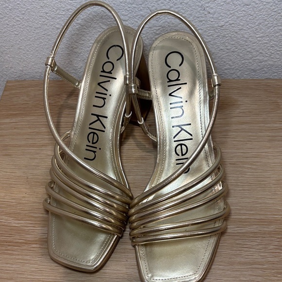 Calvin Klein | Shoes | Calvin Klein Metallic Gold Strappy Sandals ...